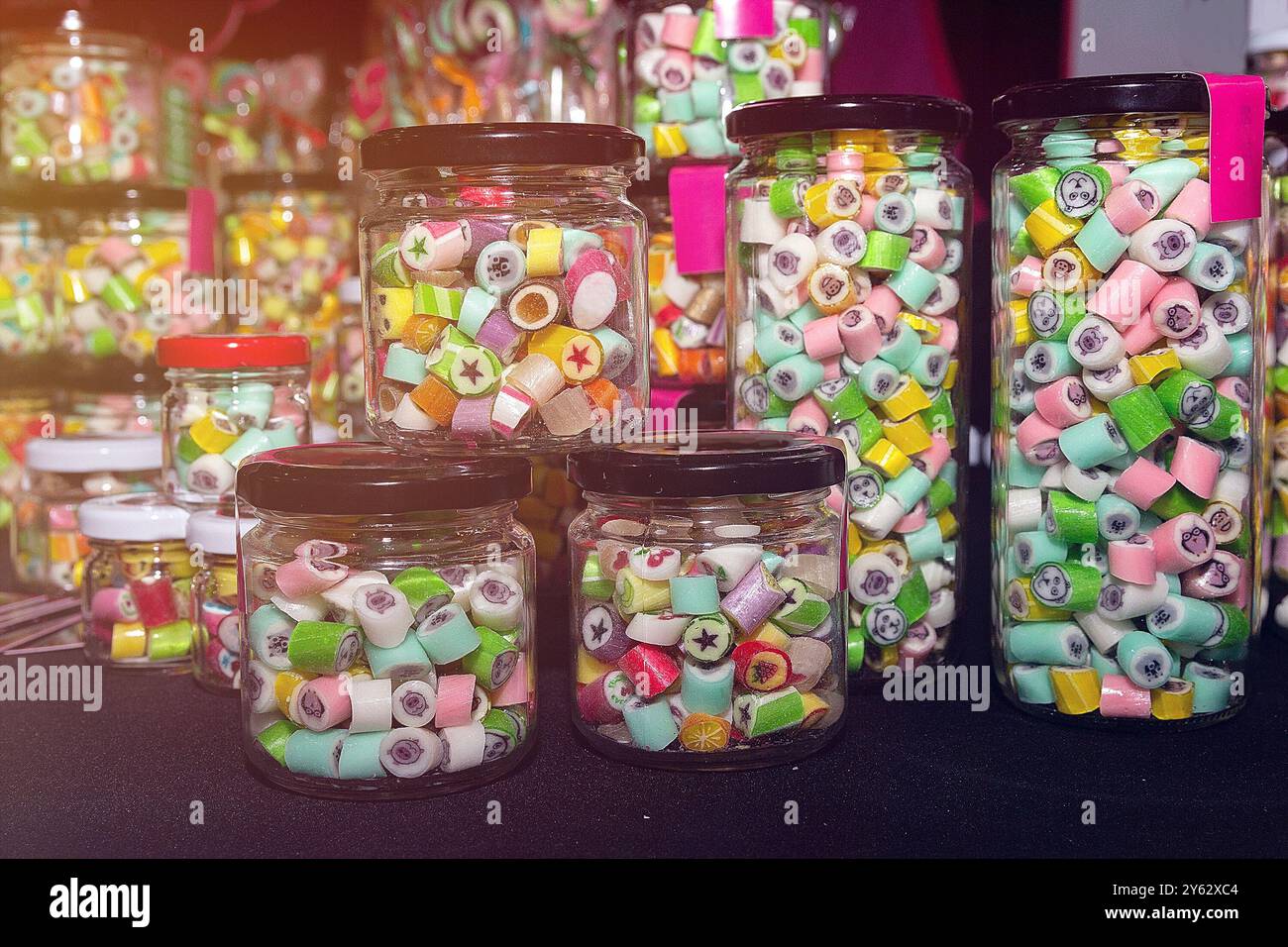 Assorted variety of colorful candy in glass container. Sweets Stock ...