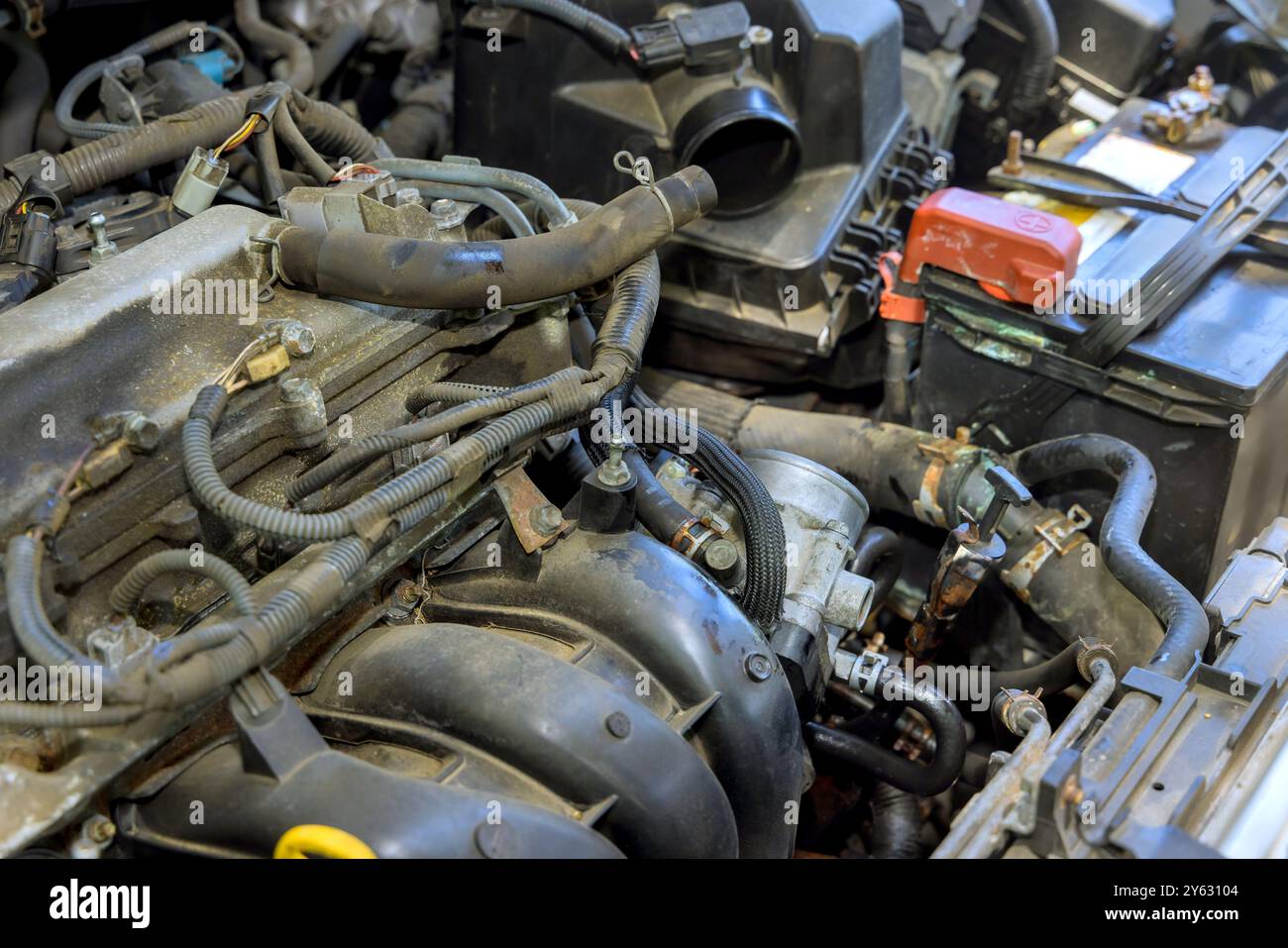 Auto mechanic working in auto garage, master repair service maintenance ...