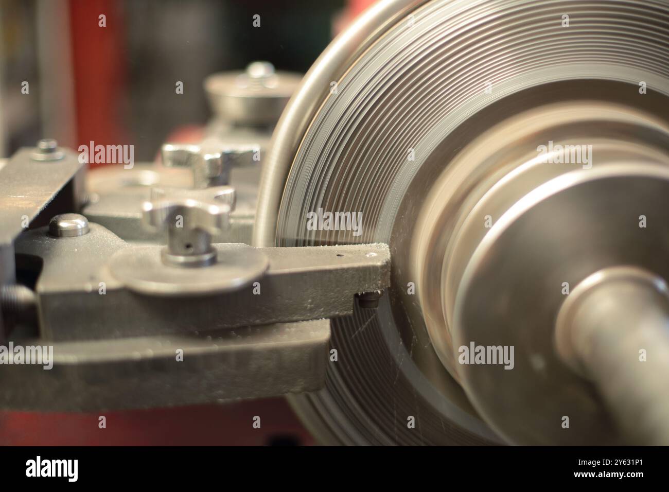 Brake disc is ground on lathe Stock Photo - Alamy