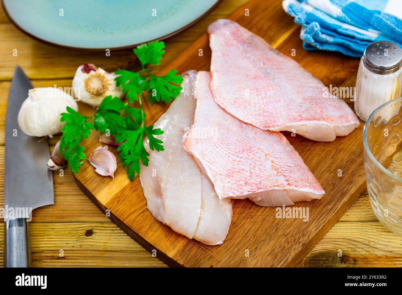 Fresh raw fillet of sea bass Stock Photo - Alamy