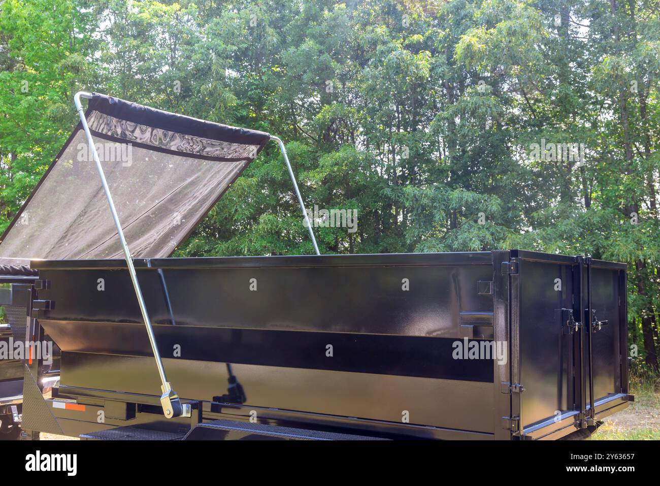 During transportation construction waste to recycling center, truck ...