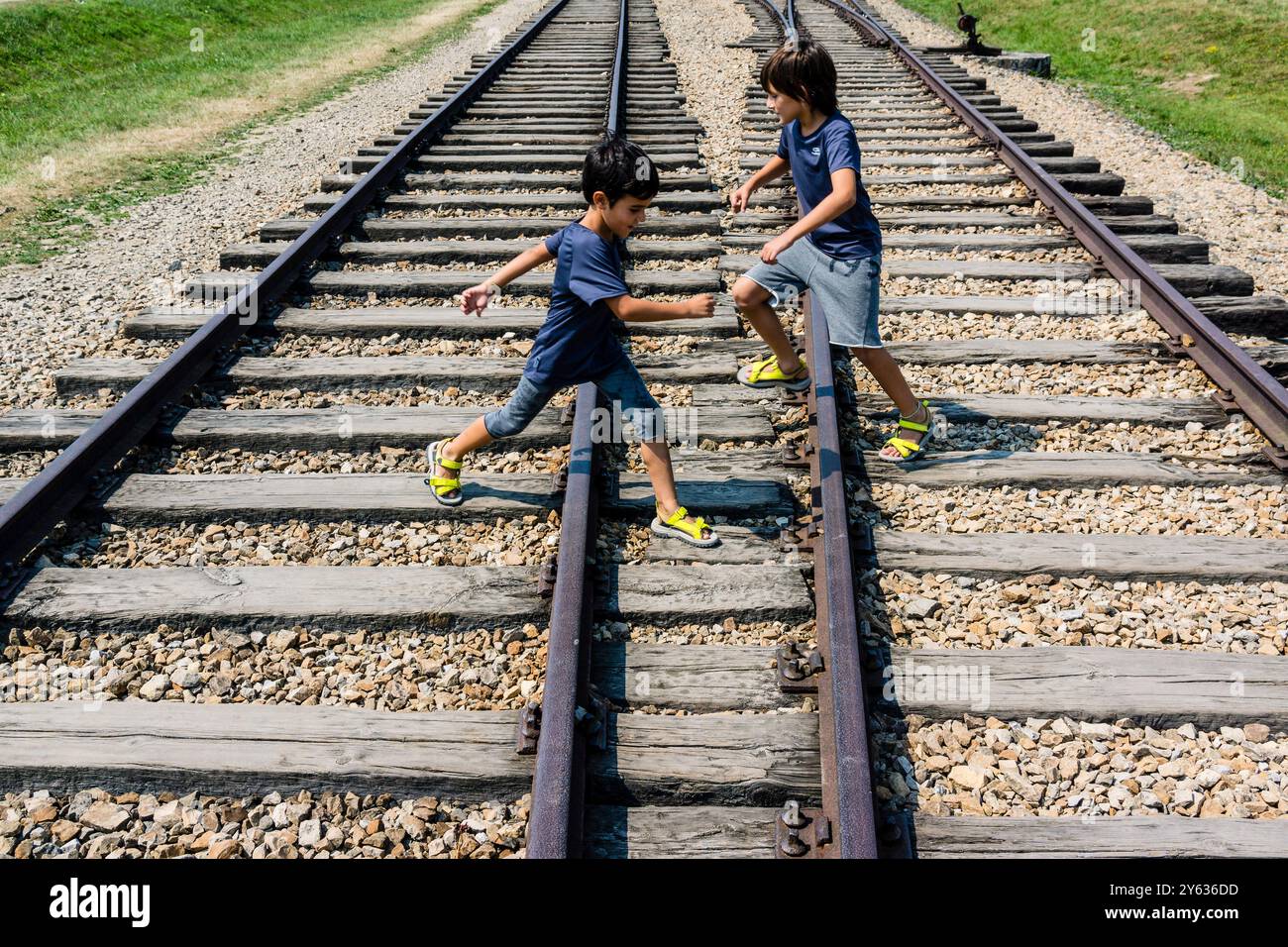 children playing on the railway tracks, Auschwitz-Birkenau ...