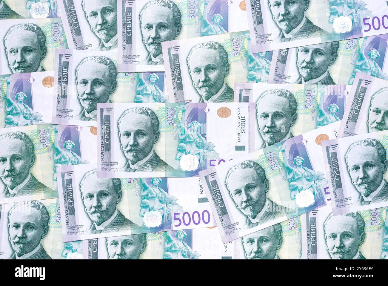 A heap of Serbian dinar paper currency, 5000 dinars value. Serbian ...
