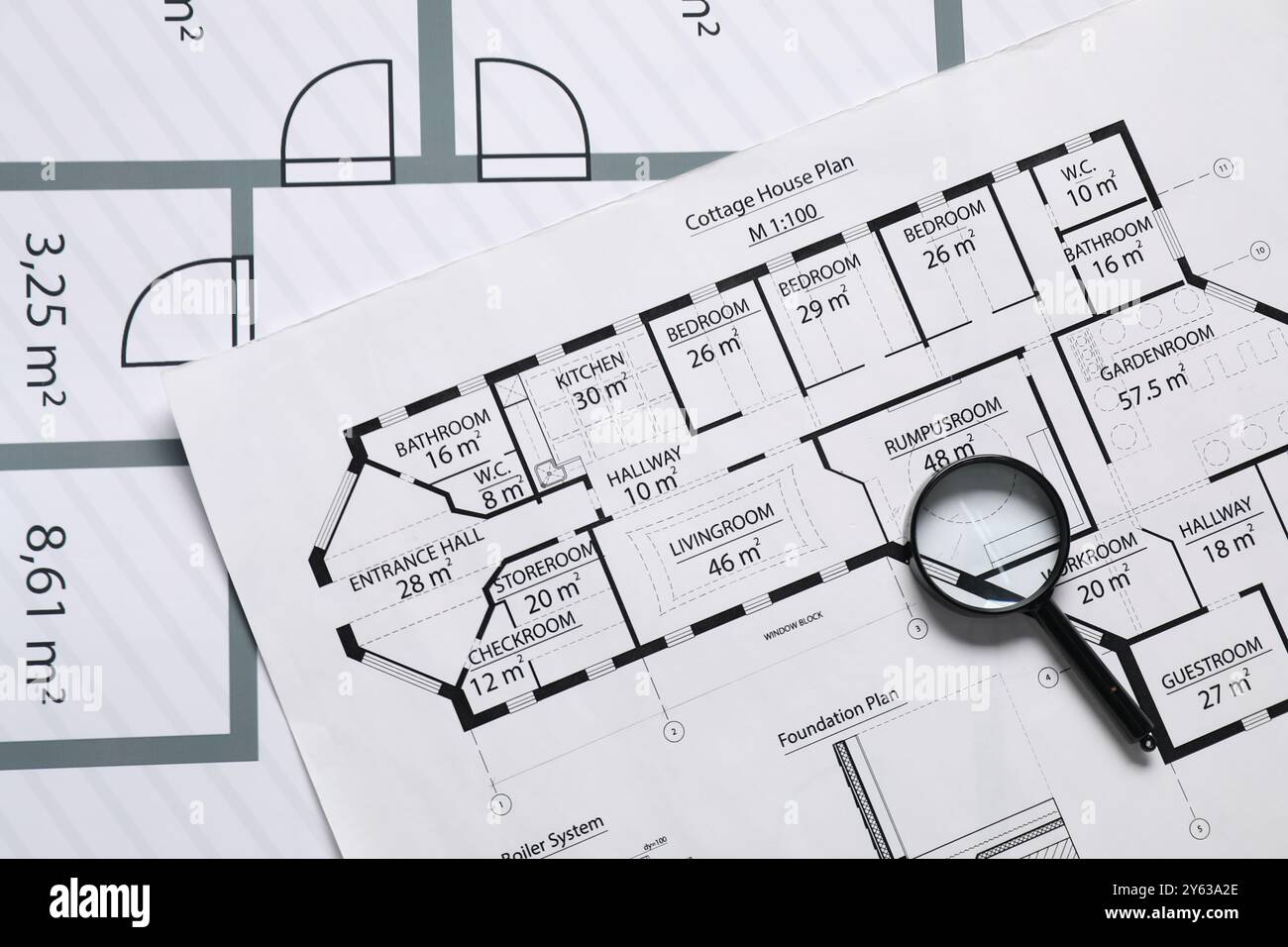 Construction drawings magnifying glass hi-res stock photography and ...