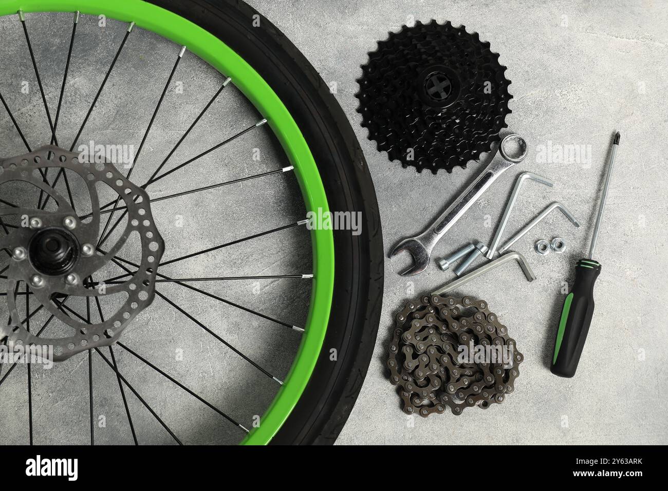 Parts of bicycle and tools on grey background, flat lay Stock Photo - Alamy