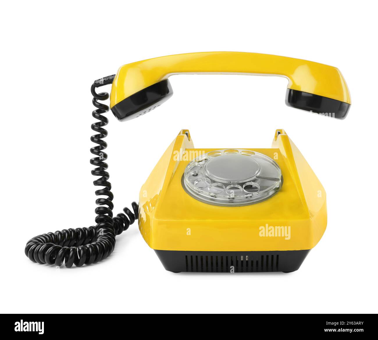 Old yellow telephone with rotary dial isolated on white Stock Photo - Alamy