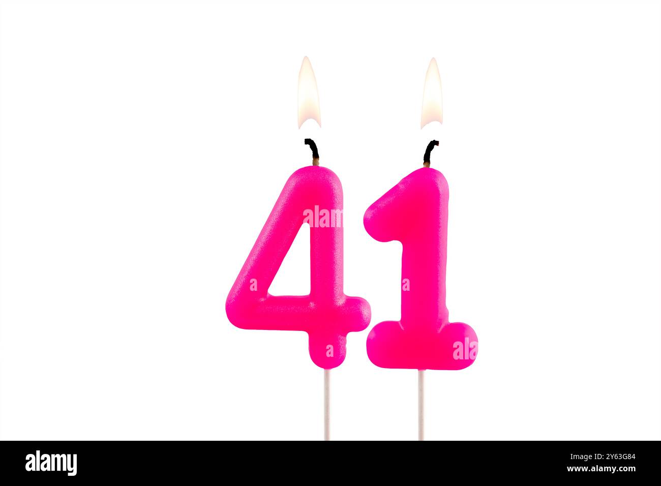 Pink number 41 birthday candle on white background Stock Photo - Alamy