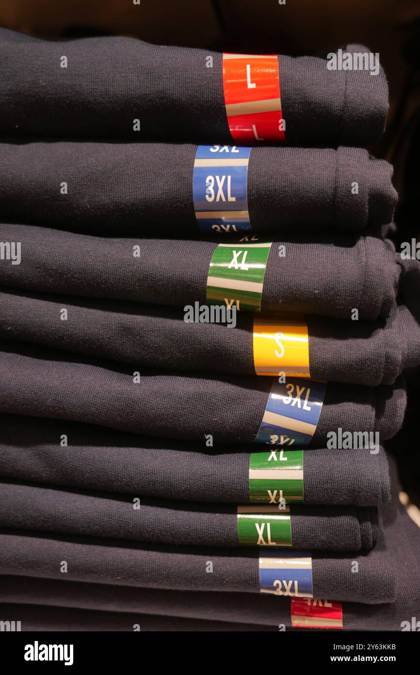 Stacked Clothing Sizes An Extensive Range of TShirts Offered in Various ...