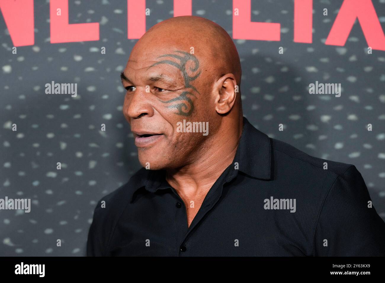 Mike Tyson arrives at the premiere of "Starting 5" on Monday, Sept. 23 ...