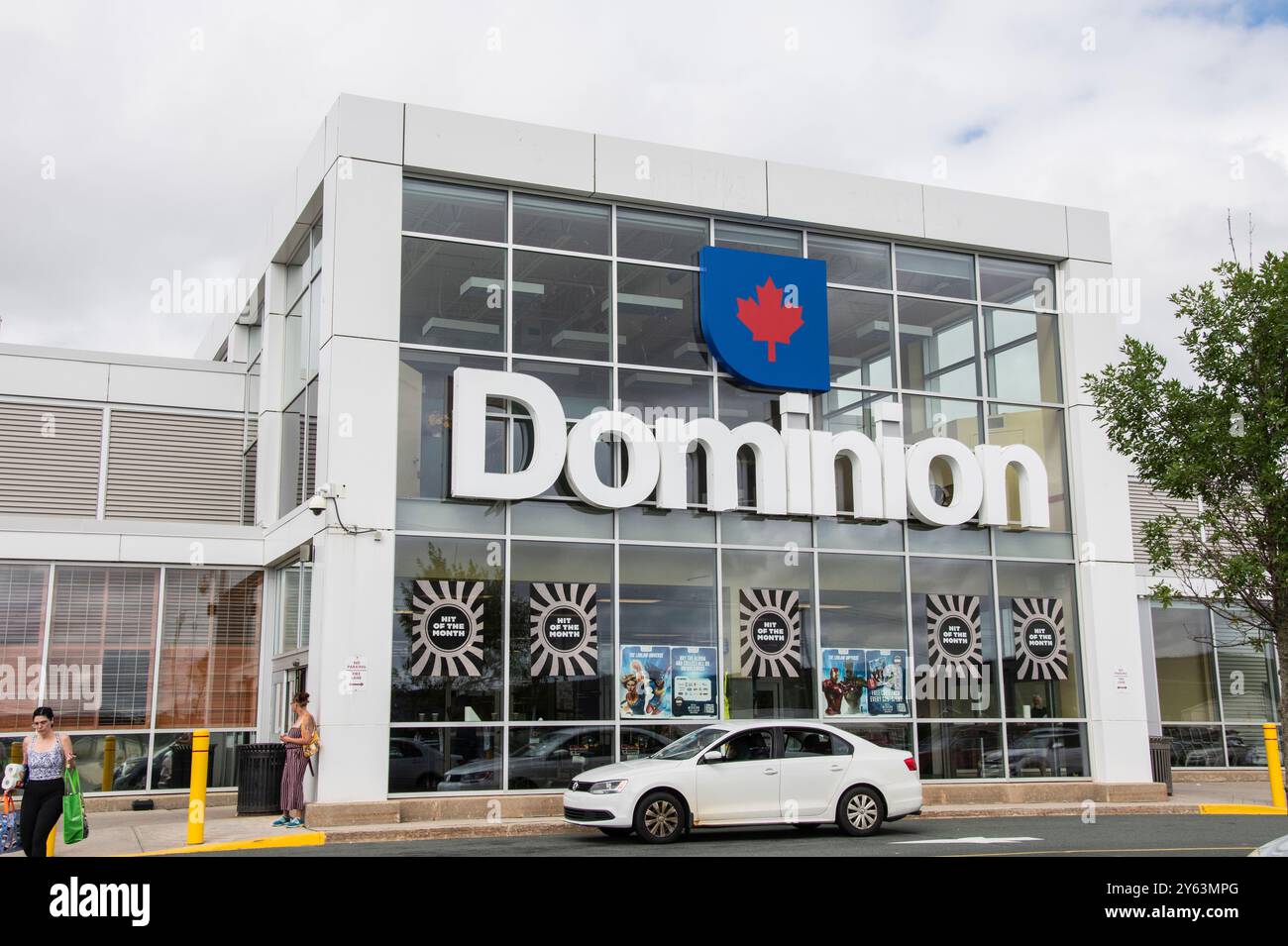 Dominion grocery store sign and hit of the month on Blackmarsh Road in St. John's, Newfoundland ...