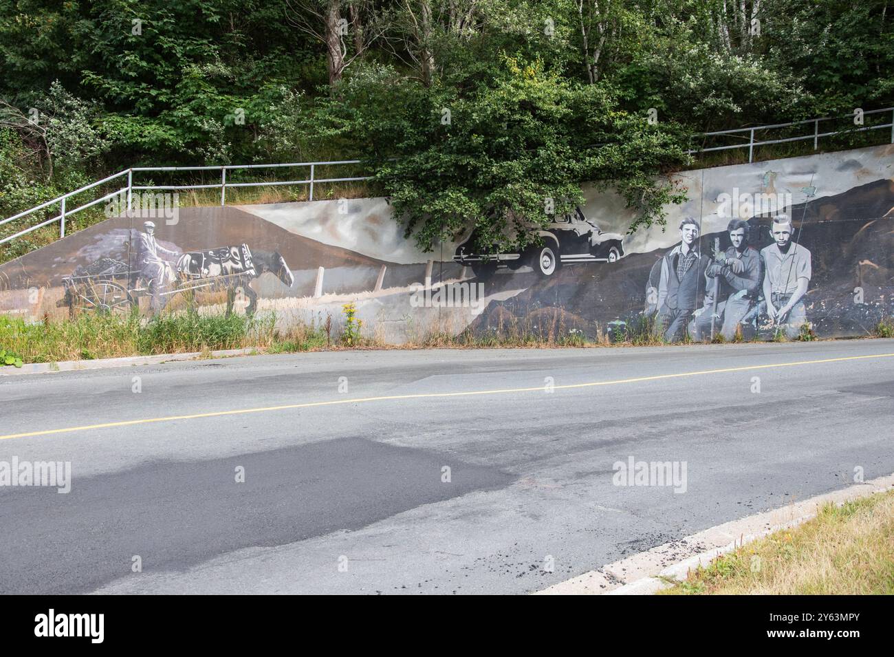 History mural of fishermen sitting on the beach on Blackhead Road in St ...