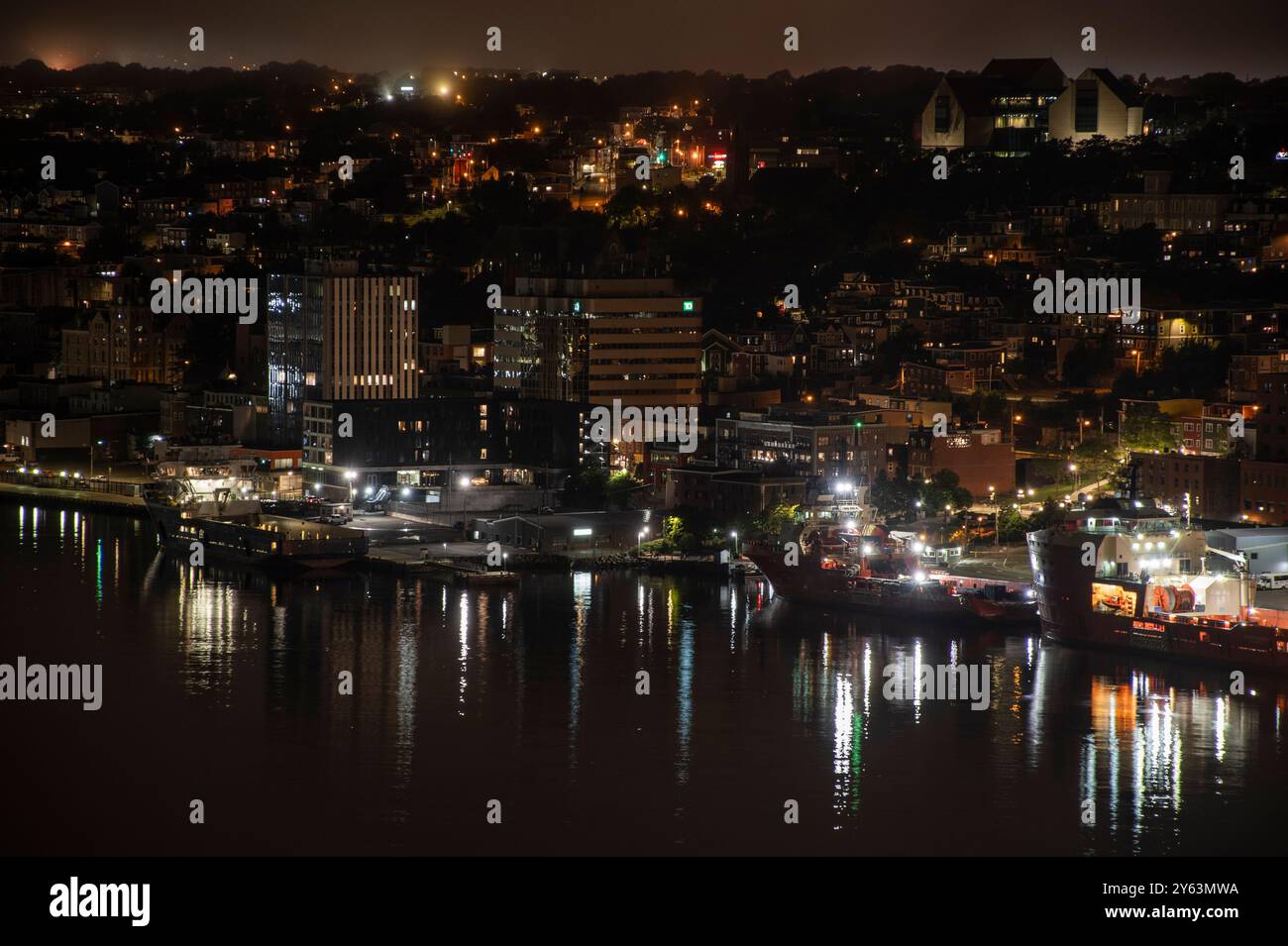 View of harbour and downtown at night in St. John's, Newfoundland ...