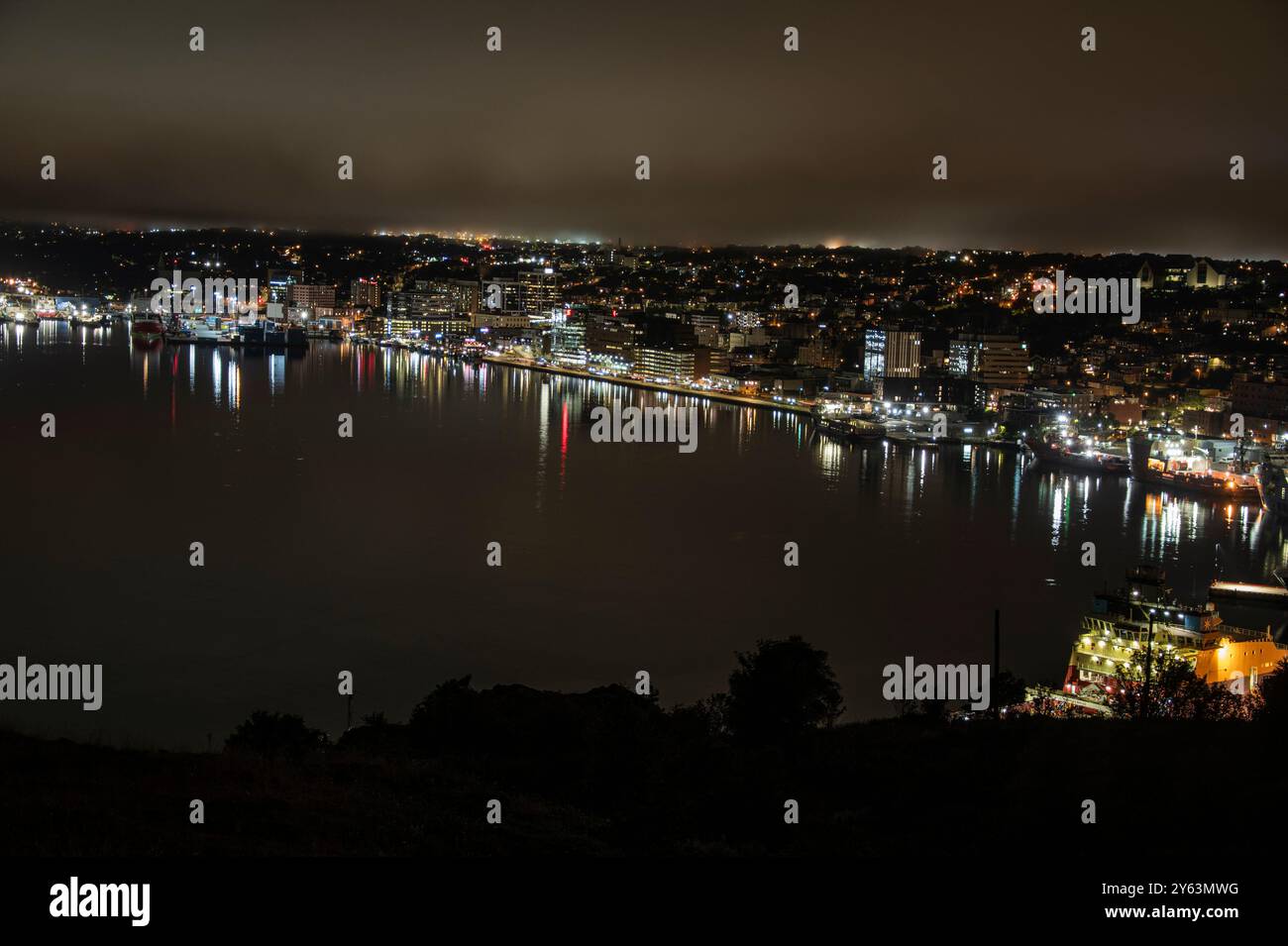 View of harbour and downtown at night in St. John's, Newfoundland ...