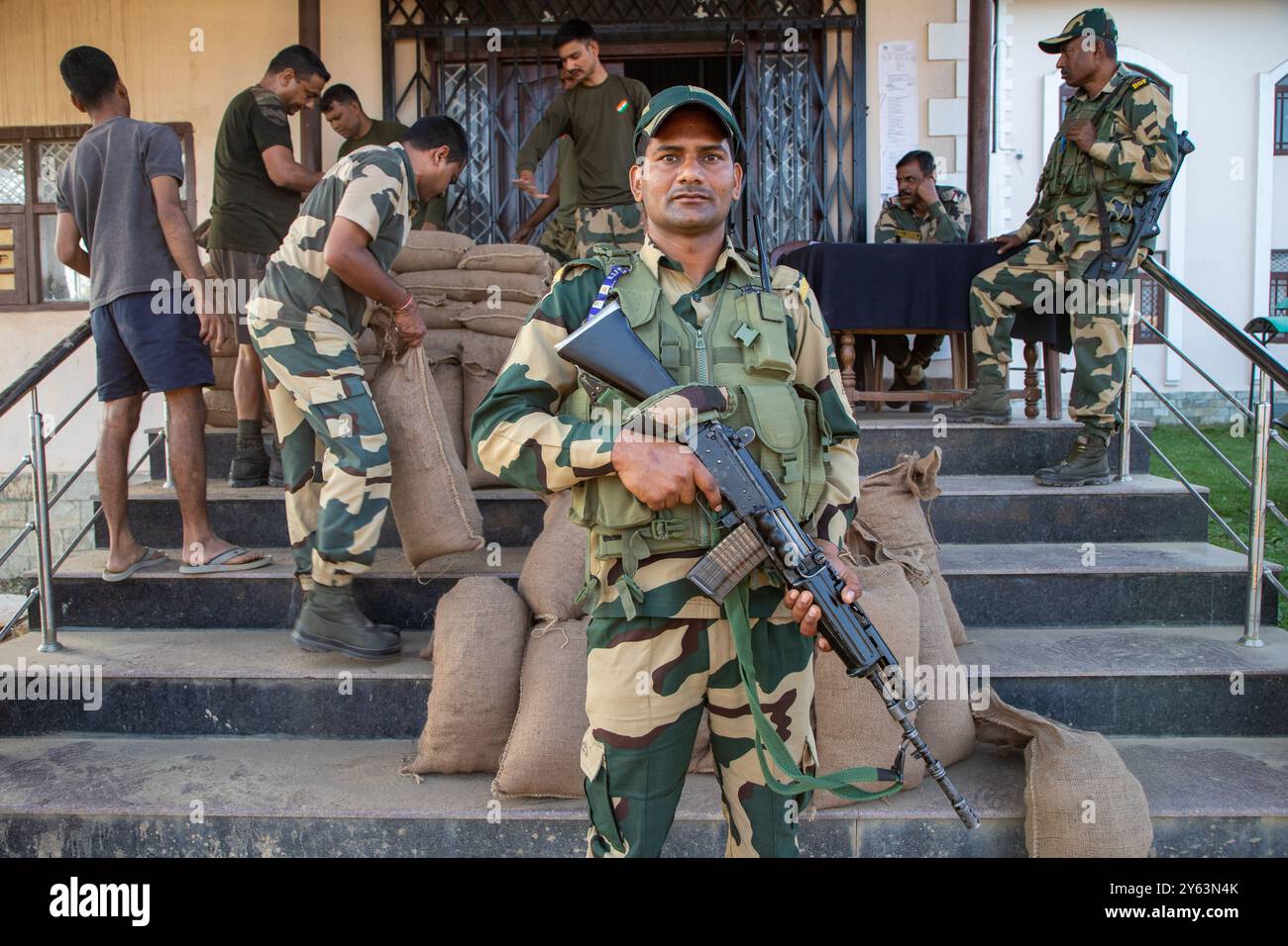 Indian Border Security Force (BSF) personnel make a temporary bunker ...