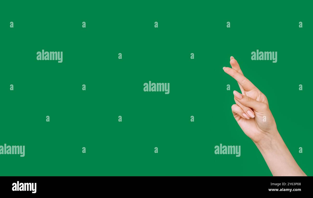 Crossed fingers. Good luck. Exciting expectation. Female hand showing ...