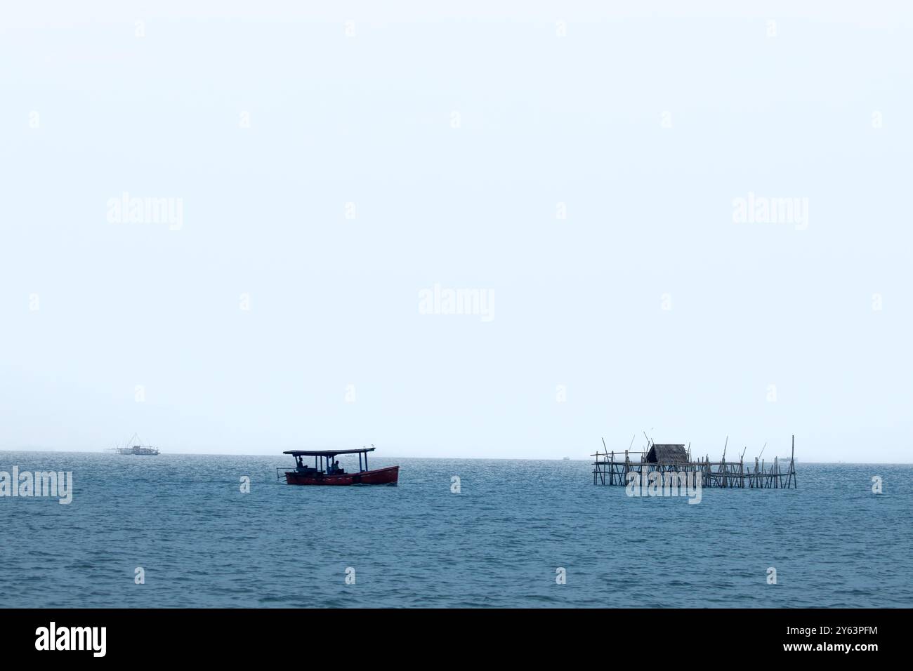Bagan Apung with Fishing Boat in the Middle of the Ocean. Crystal Blue ...