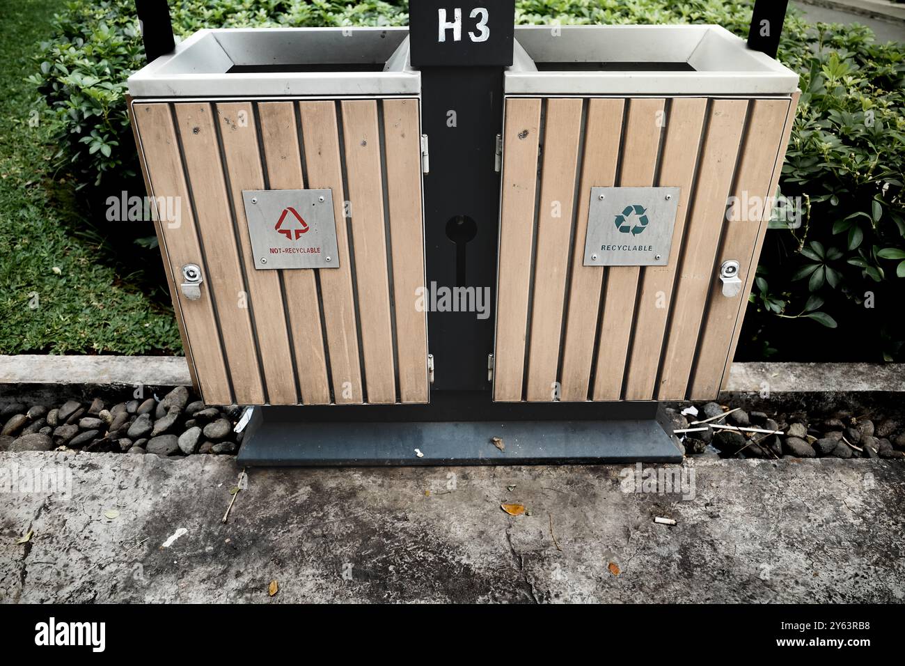 Dual Recyclable and Non-Recyclable Trash Containers Standing in Outdoor ...