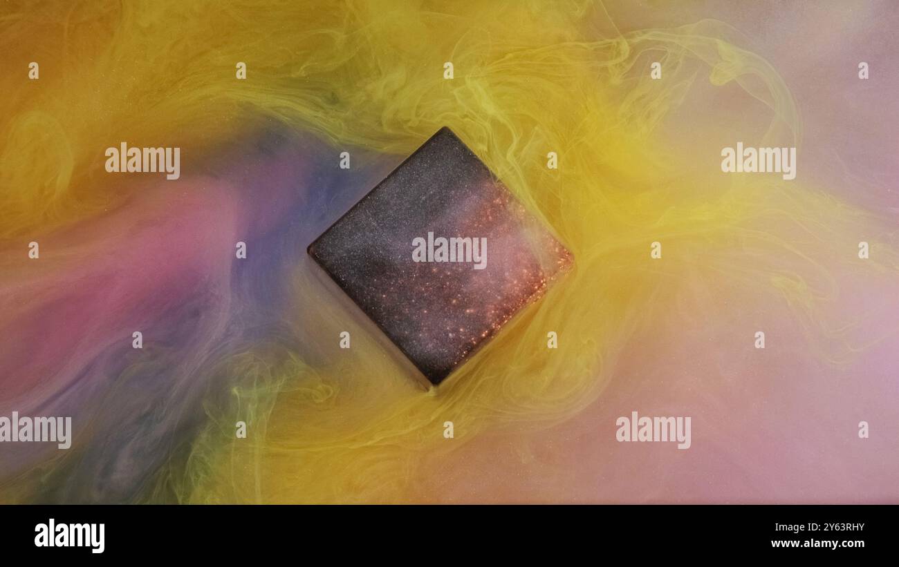 Ink fog. Color water. Abstract yellow purple paint smoke streaming ...