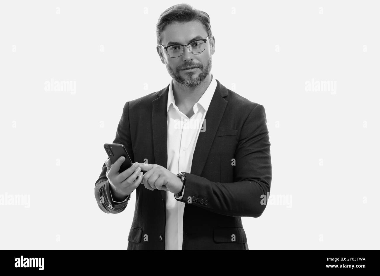 Business man in business suit using smart phone. Portrait attractive ...