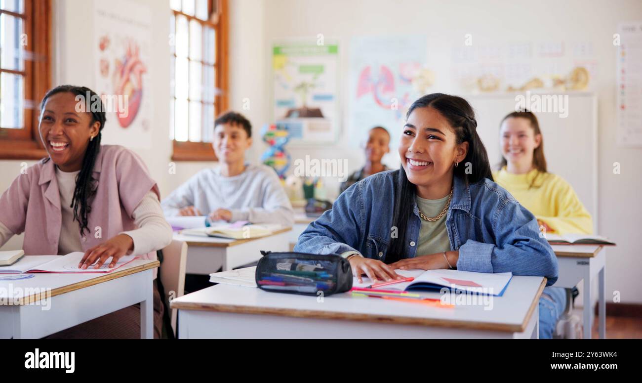 Happy teenagers, students and laughing with humor in classroom for ...