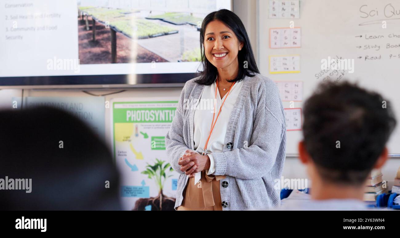 School, sustainability and presentation with teacher in classroom for ...