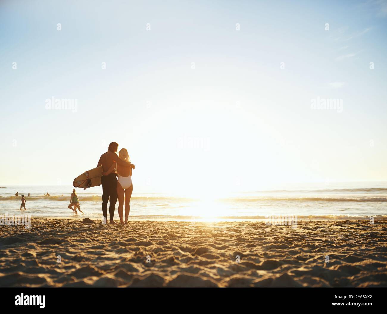Beach, couple and hug with surfboard for love in bonding, break and ...