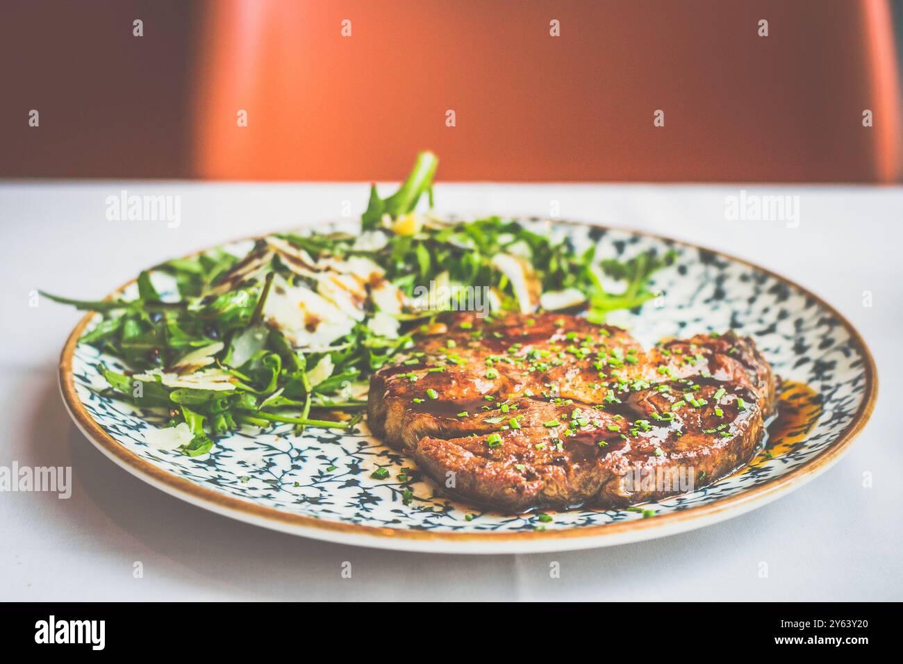 Costata Di Manzo 220gr Angus Beef Ribeye, rucola, & parmesan salad ...