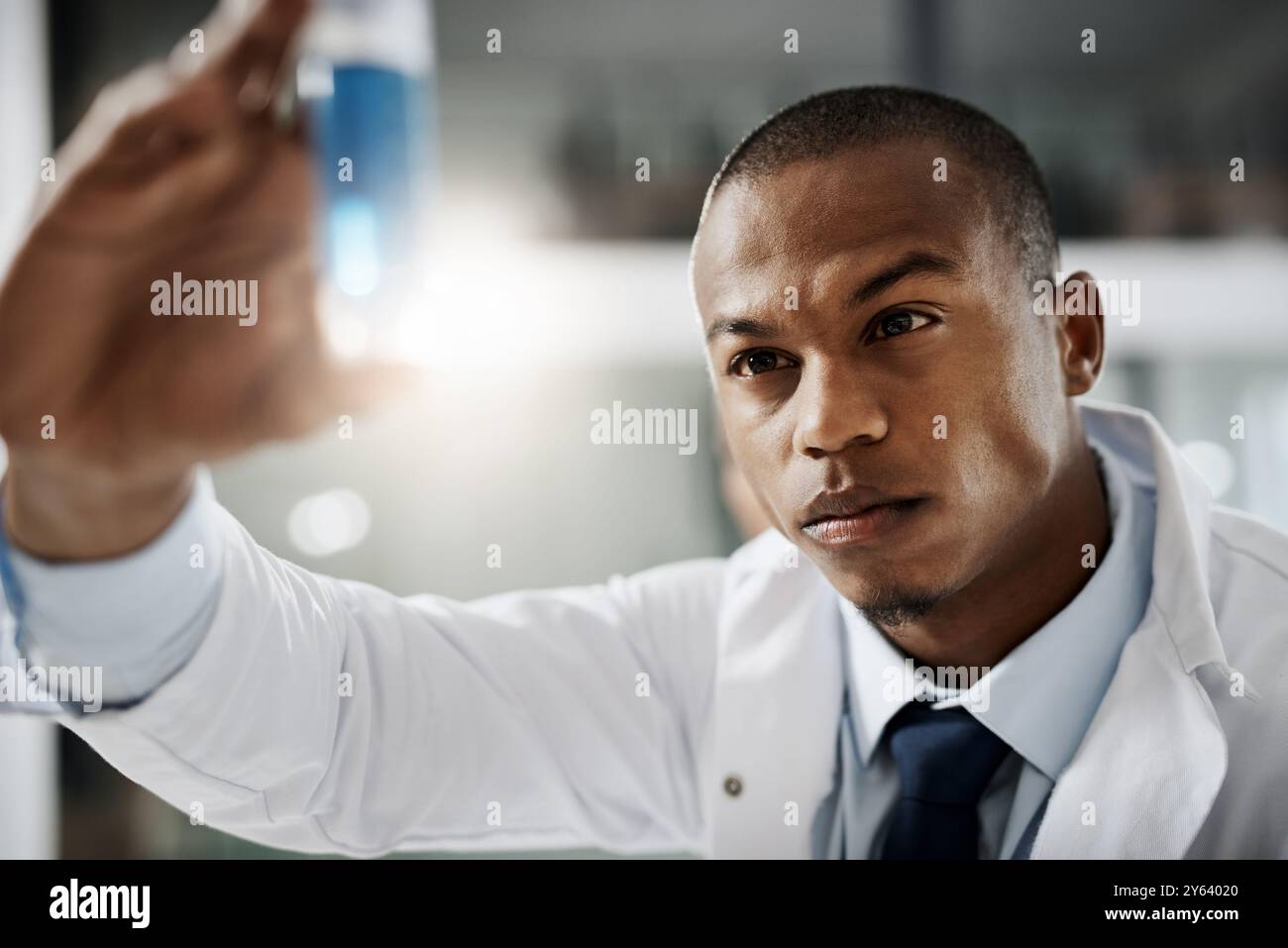 Science, thinking and man with brainstorming, lens flare and analyzing ...