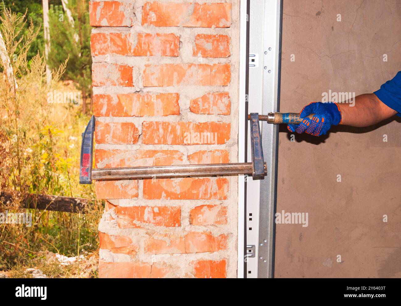 Close up on house garage door jamb installation Stock Photo - Alamy