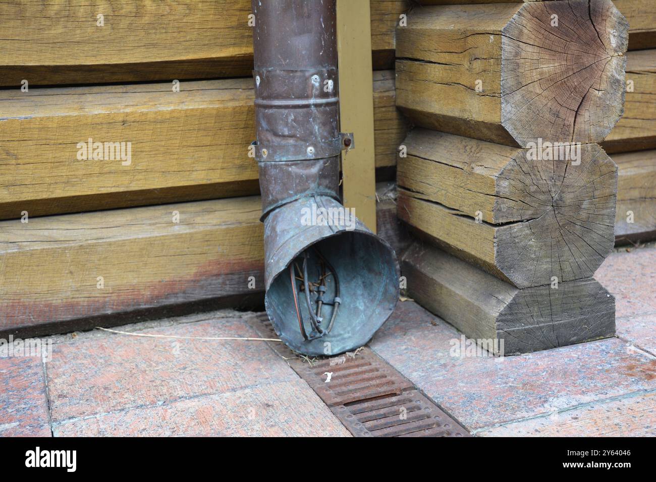 Copper raing gutter pipe with deicing cable and drainage near the ...