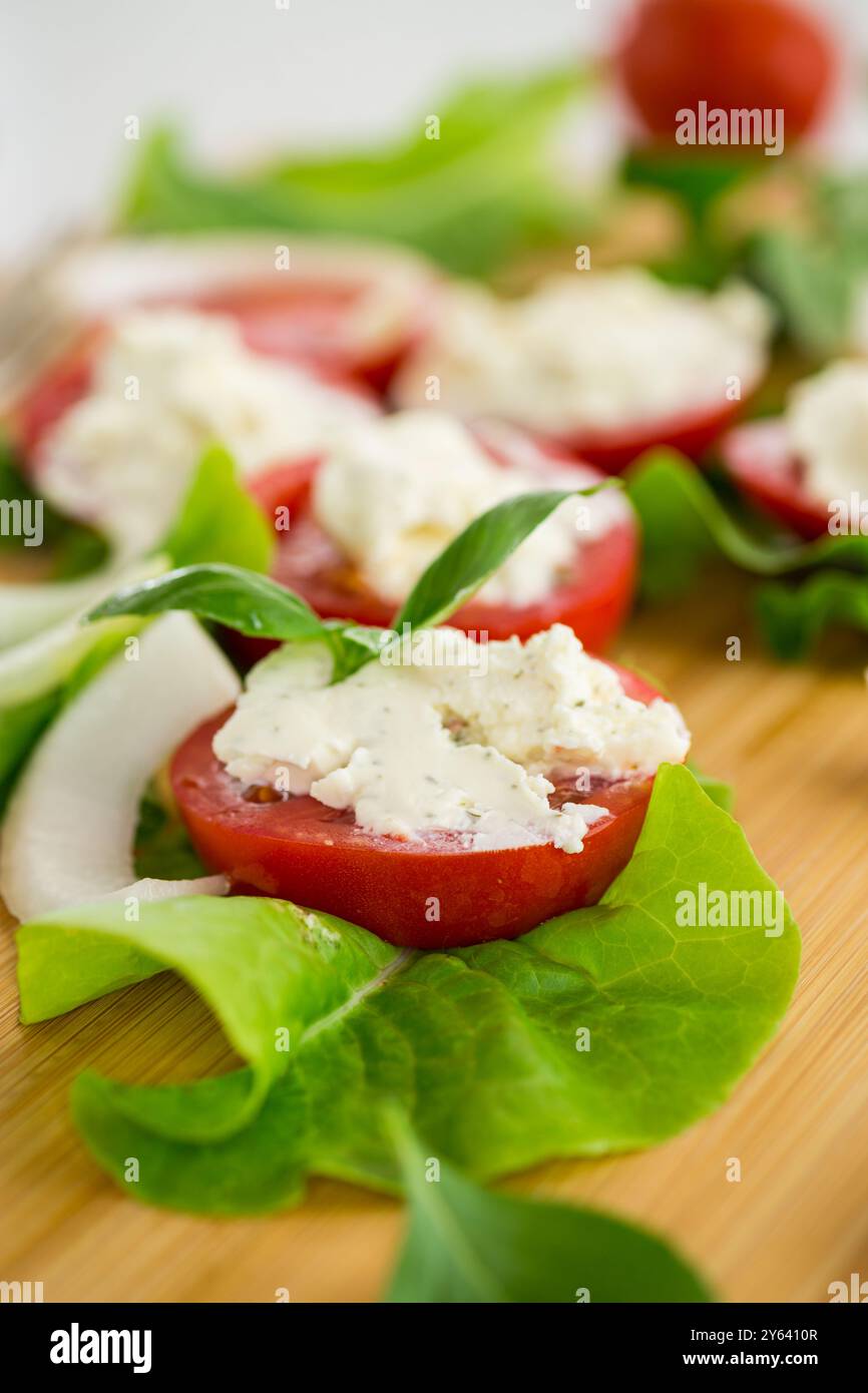 tomato wedges with cottage cheese filling and garlic, spicy appetizer ...