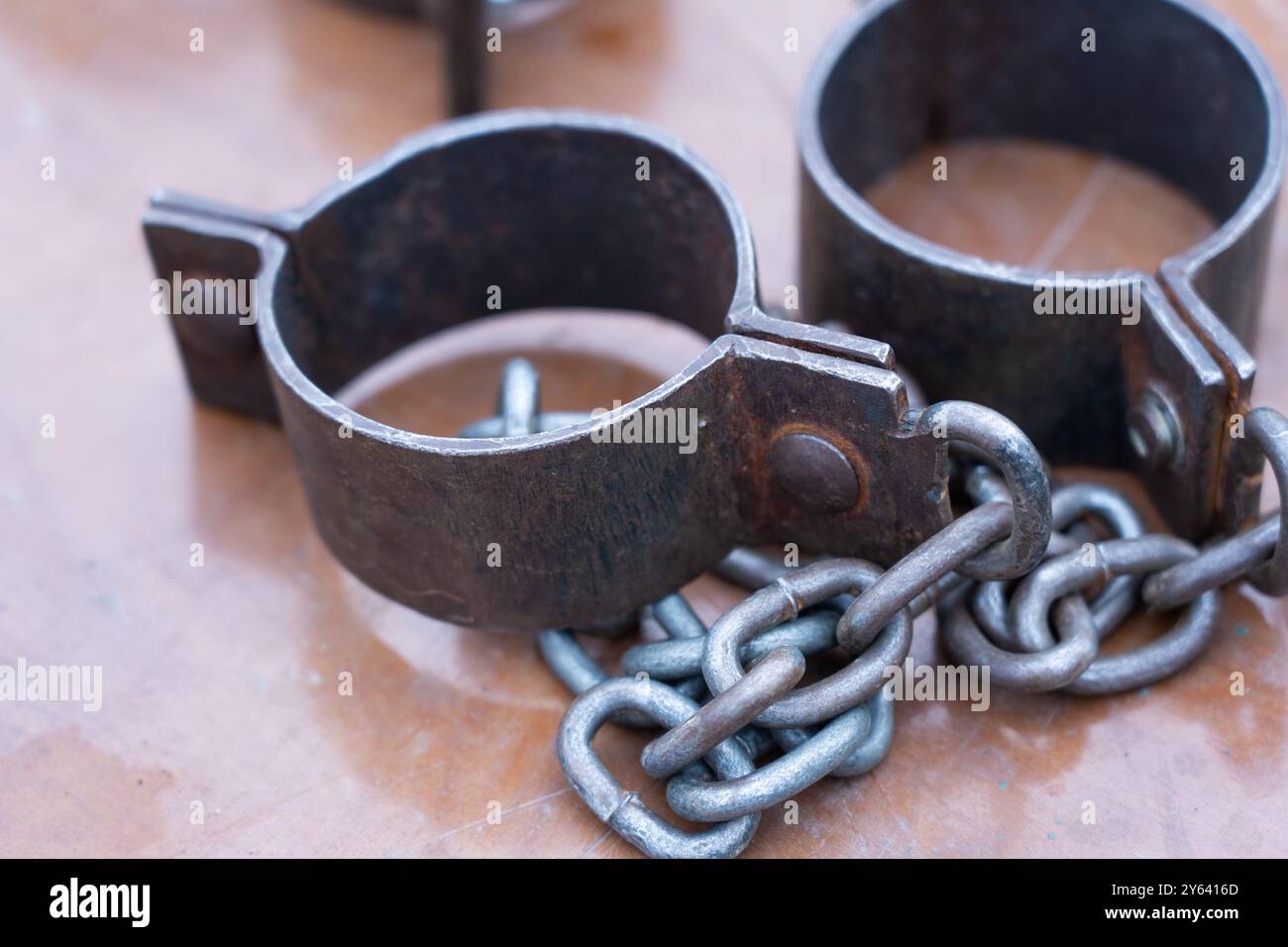 Ancient iron shackles of a slave with a chain Stock Photo - Alamy