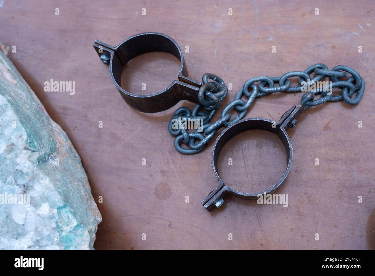 Ancient iron shackles of a slave with a chain Stock Photo - Alamy