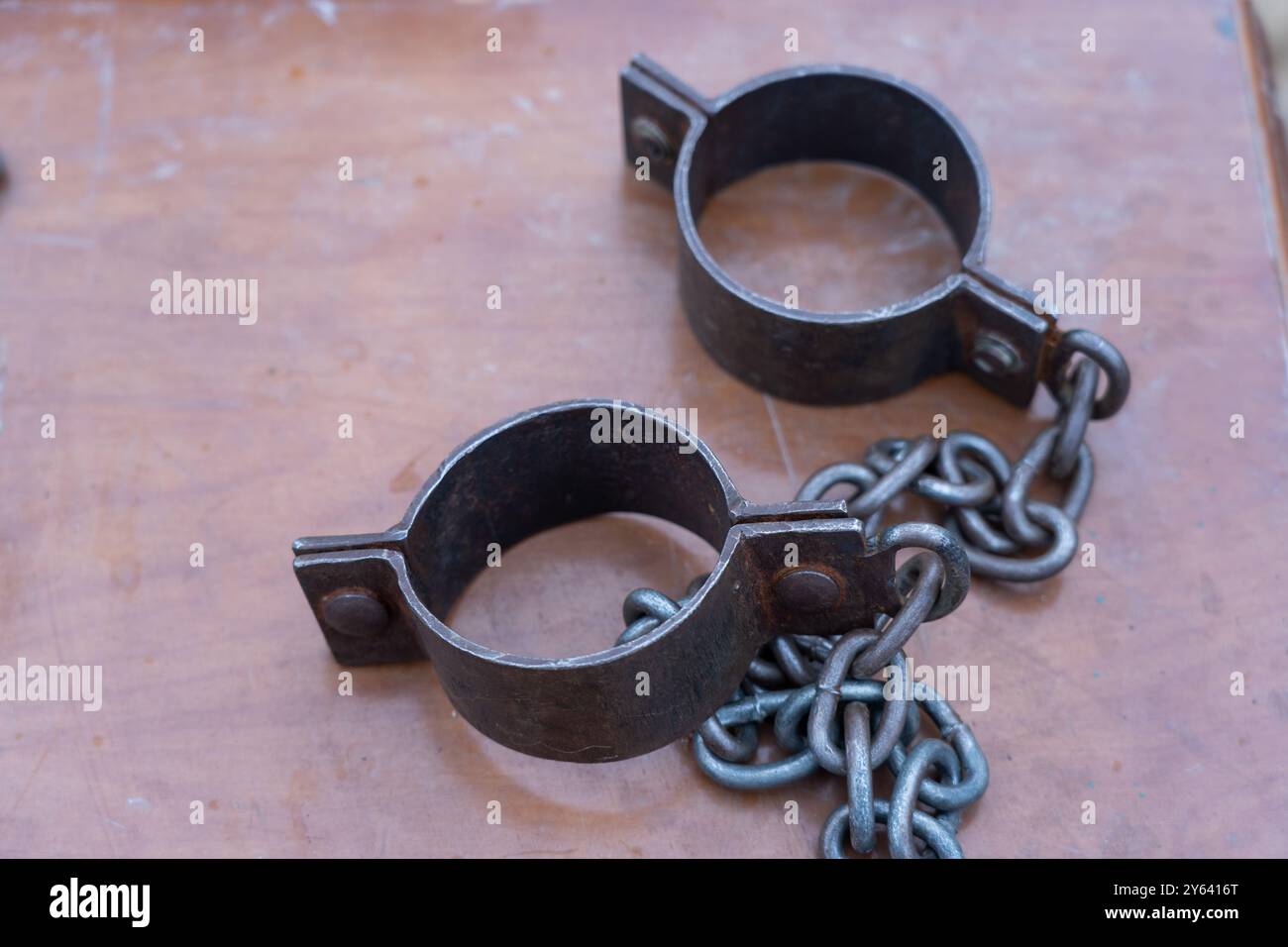 Ancient iron shackles of a slave with a chain Stock Photo - Alamy