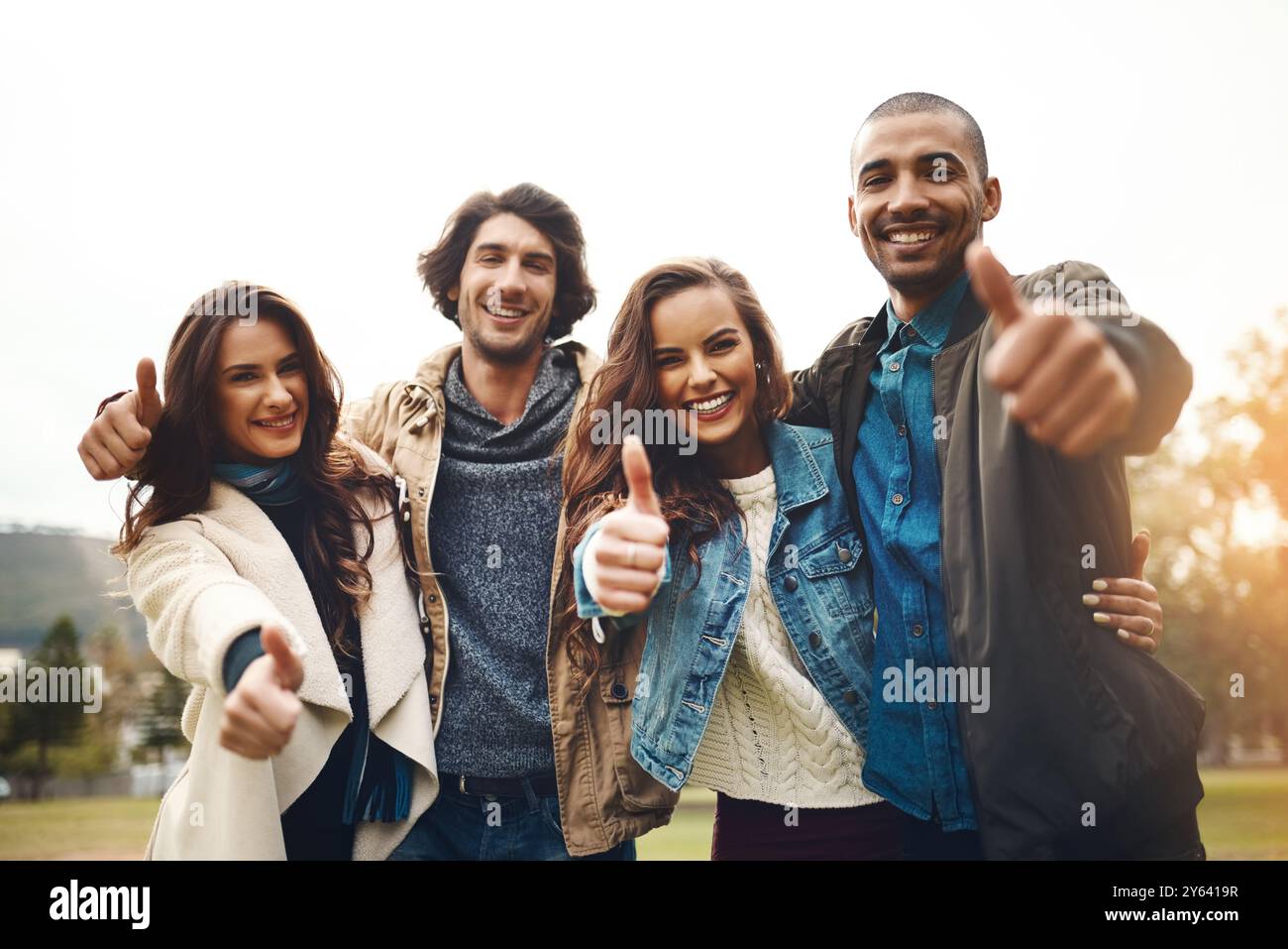 Smile, thumbs up and portrait of couple of friends in nature for ...