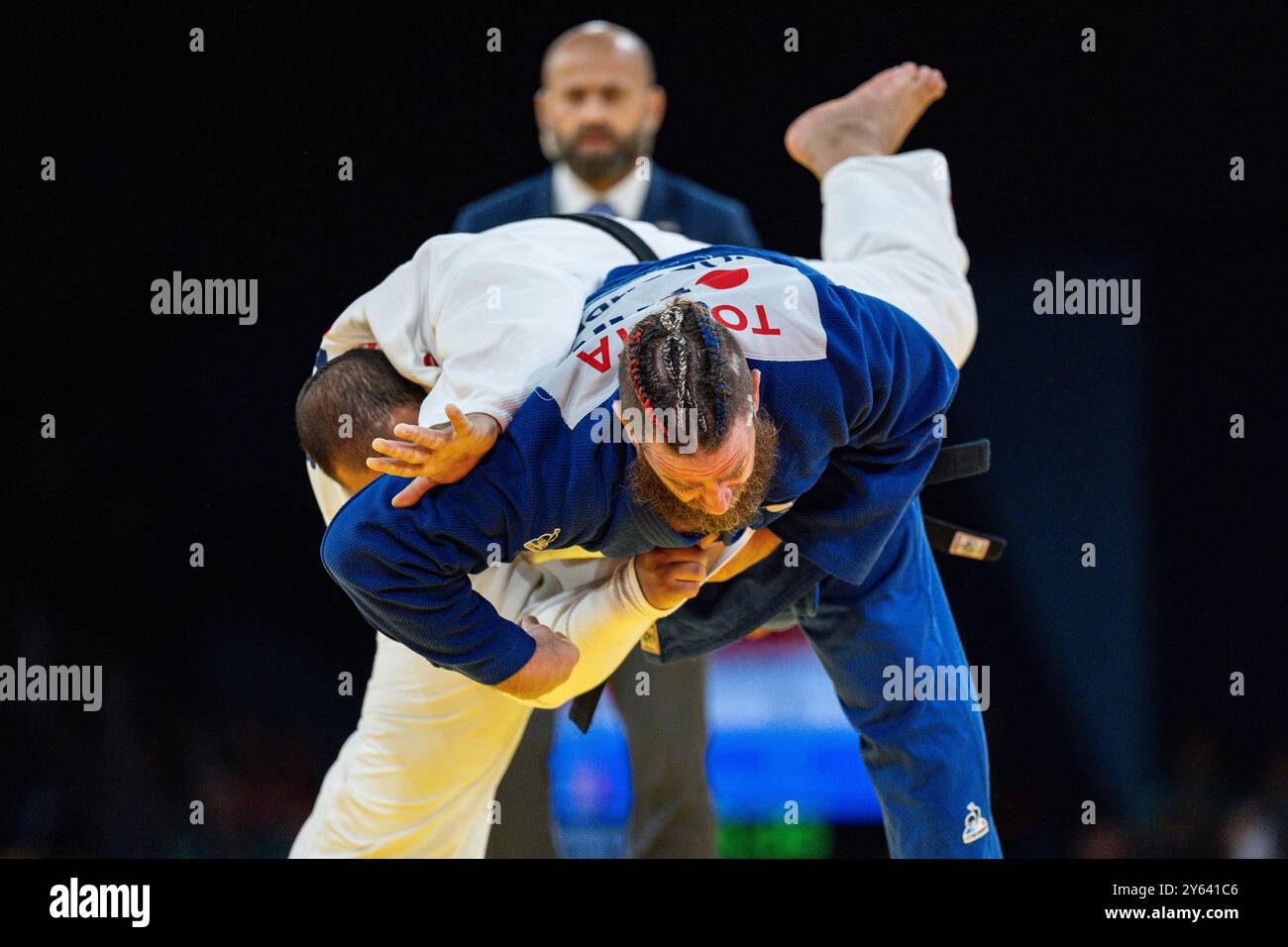 Jason Grandry (blue) of Team France defeats Onur Tastan (white) of Team ...