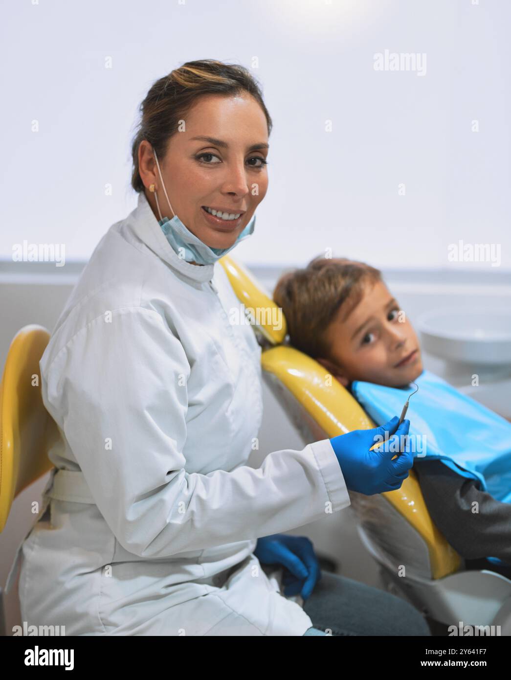 Dentist, kid and patient with smile portrait for tooth extraction ...