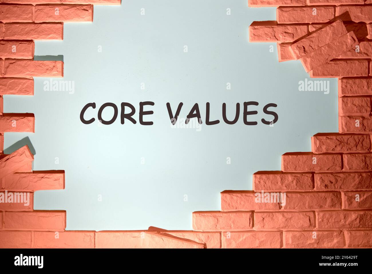 Business and core values concept on the wall under the dismantled bricks Stock Photo - Alamy