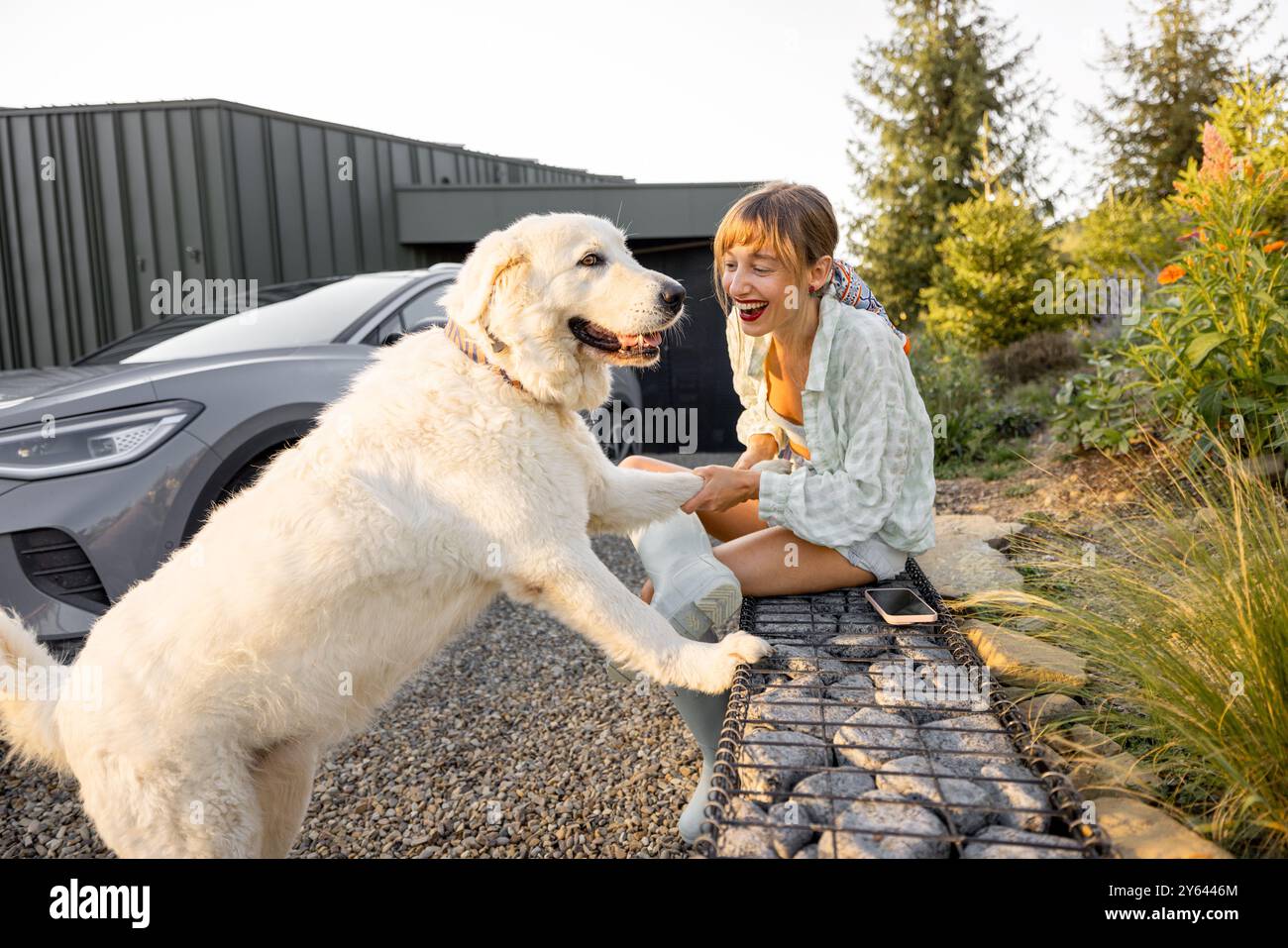 Joyful Bond with a Furry Friend Stock Photo - Alamy