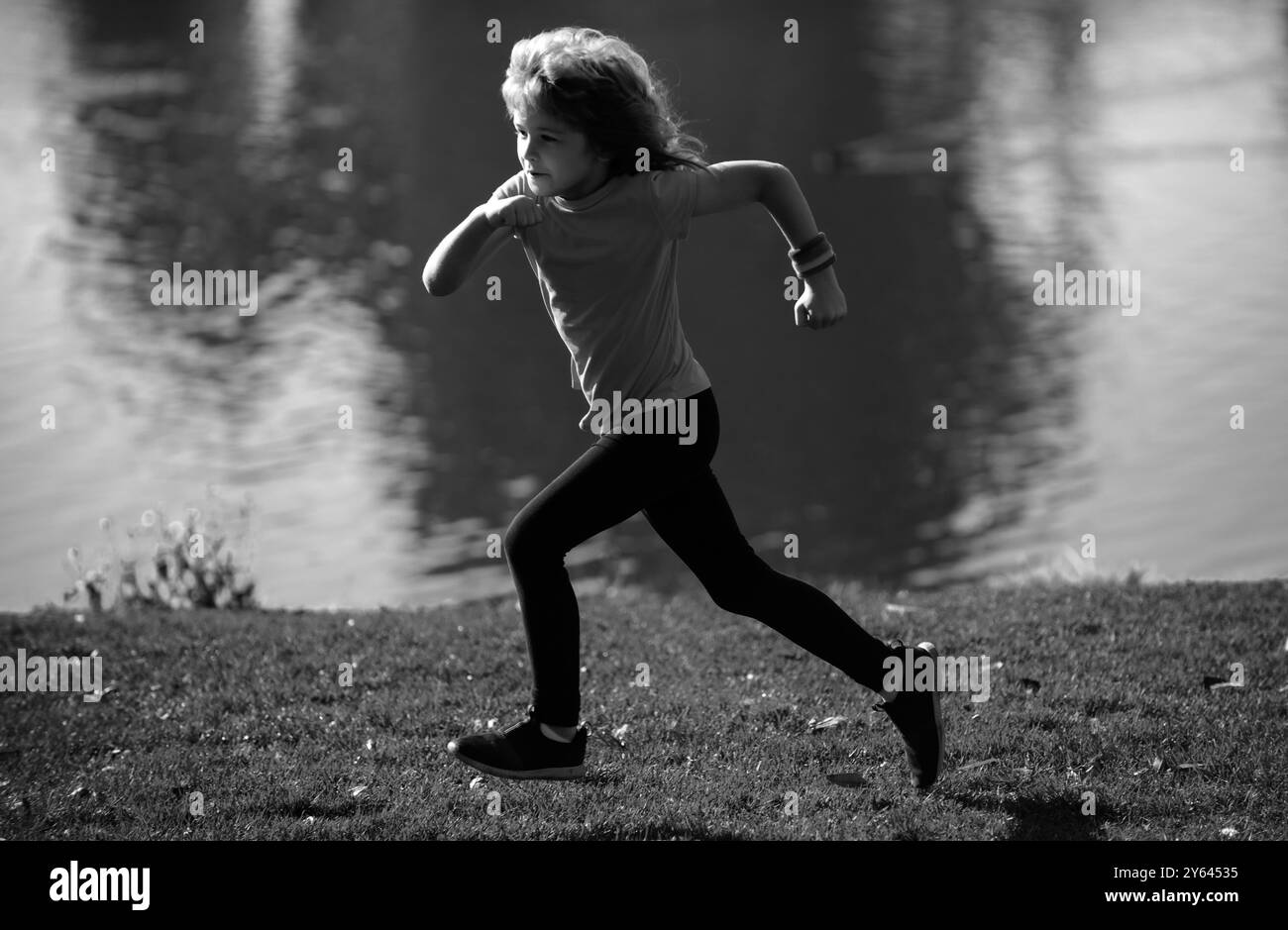 Kids jogging in park outdoor. Little boy running in nature. Active ...
