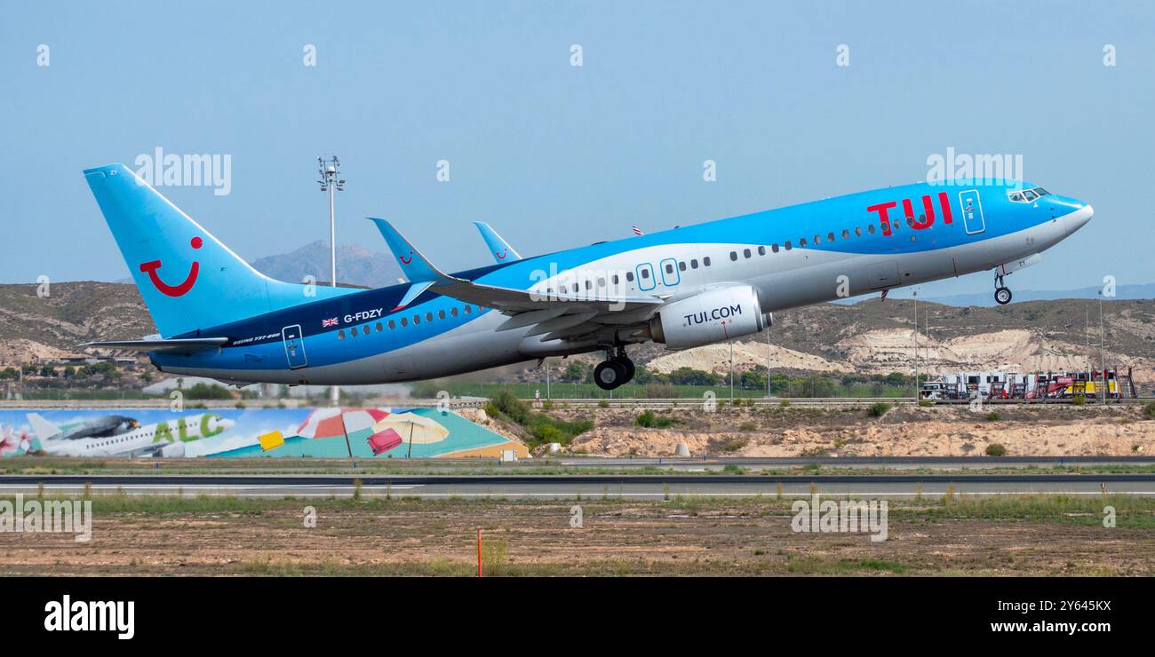 Boeing 737 airliner of the TUI Airways airline taking off from Alicante ...