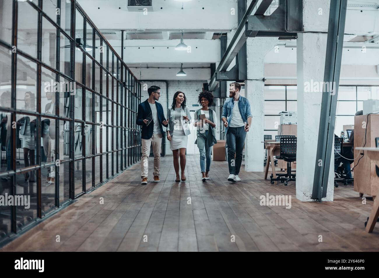 Young business professionals. Full length of young modern people in ...