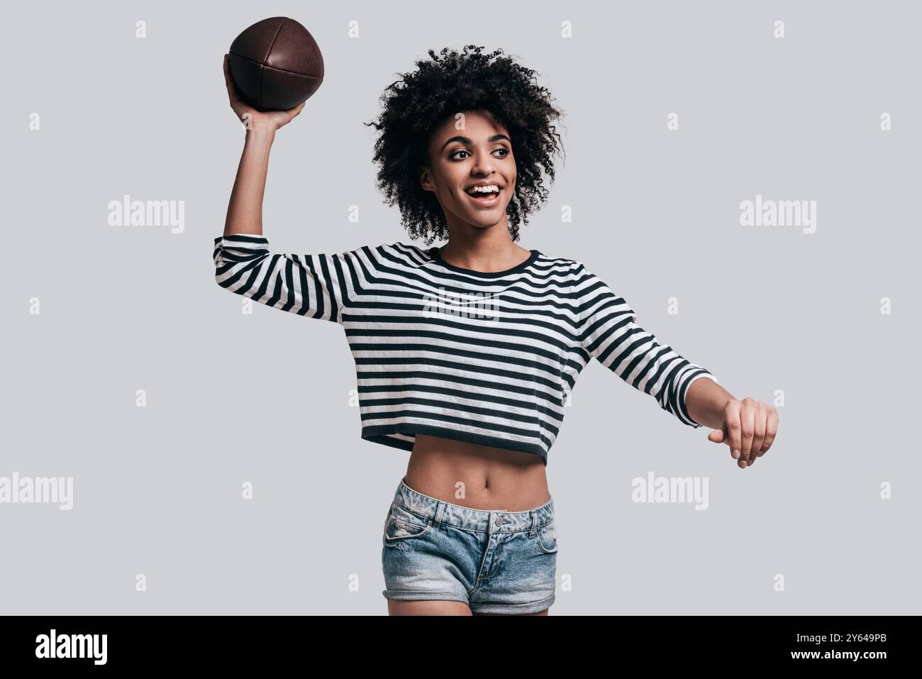 Cute woman throwing ball playing hi-res stock photography and images ...