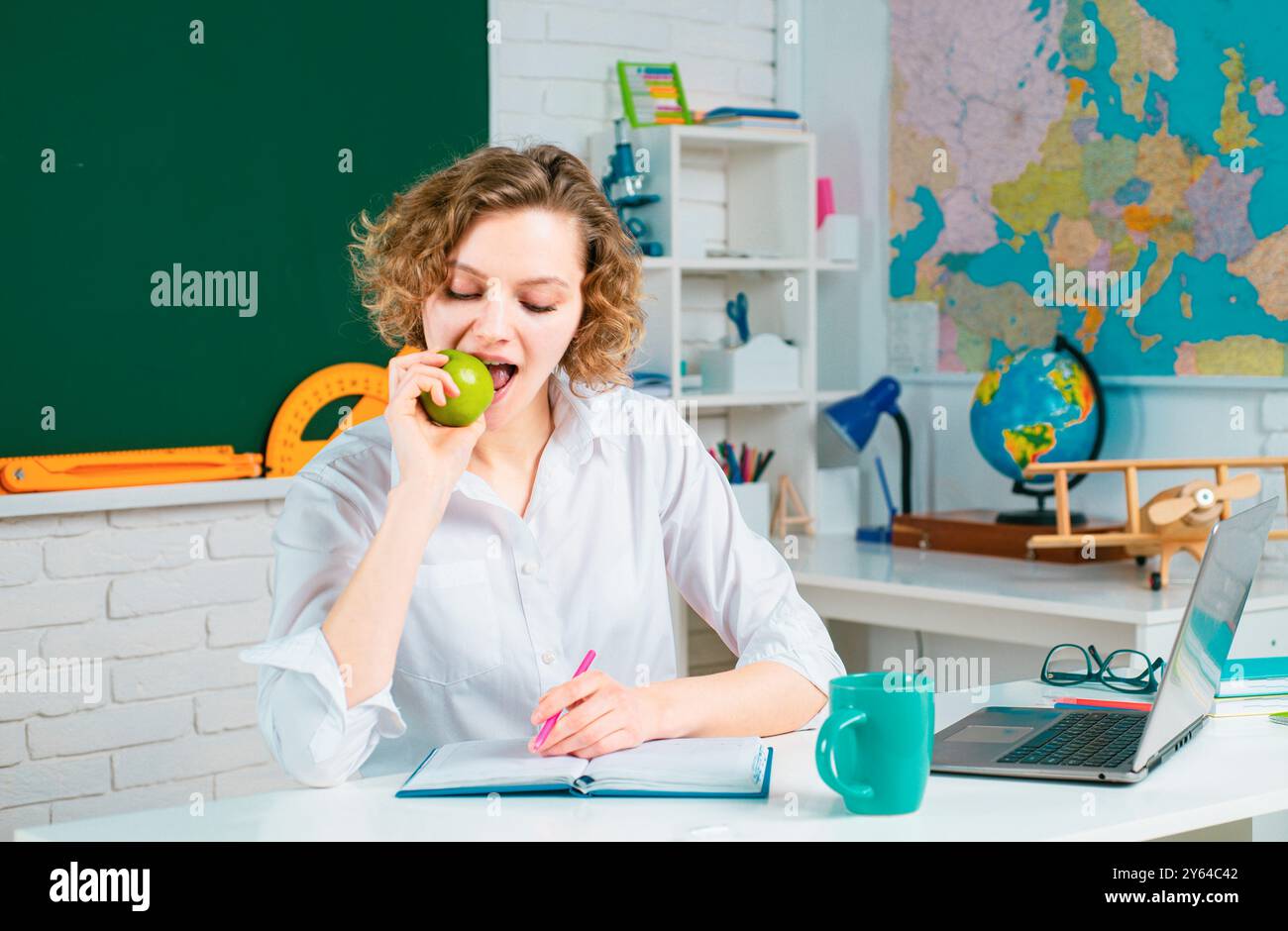 School lunch. Teacher eat in classroom. Education and learning ...