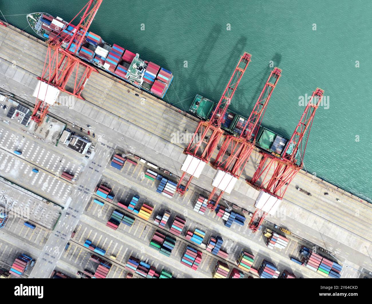 LIANYUNGANG, CHINA - SEPTEMBER 24, 2024 - Cargo ships dock at the berth ...