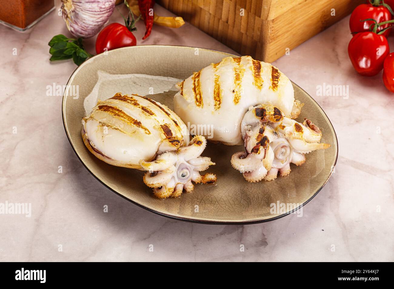 Grilled gourmet cuttlefish in the plate Stock Photo - Alamy