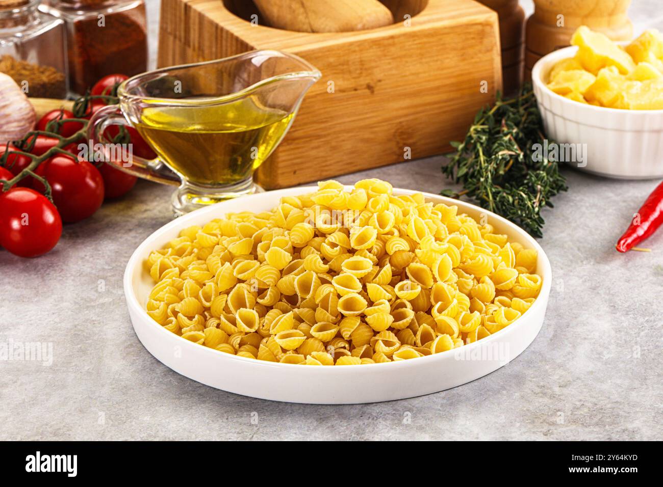 Italian cuisine - dry conchiglie shell pasta Stock Photo - Alamy