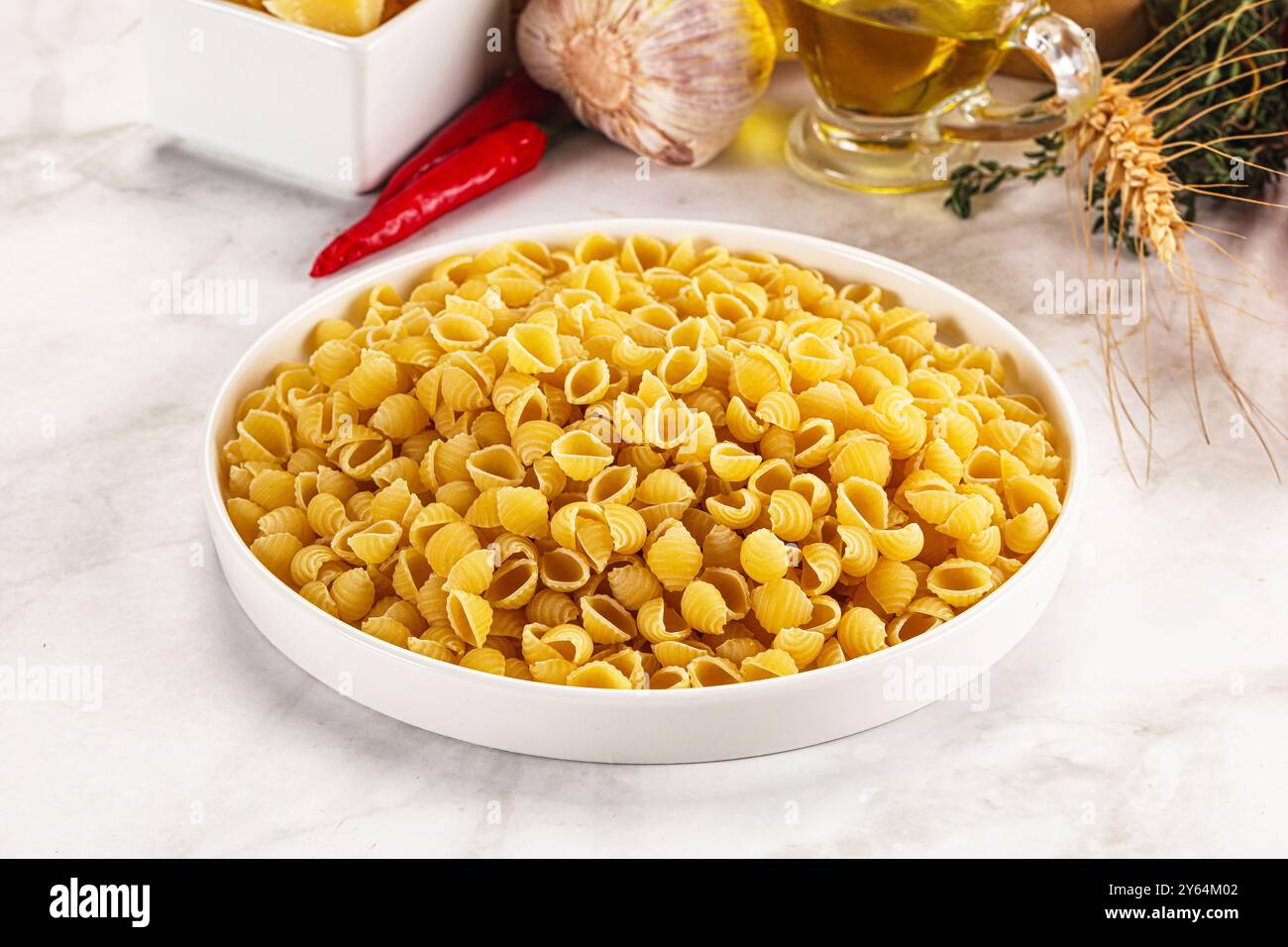 Italian cuisine - dry conchiglie shell pasta Stock Photo - Alamy