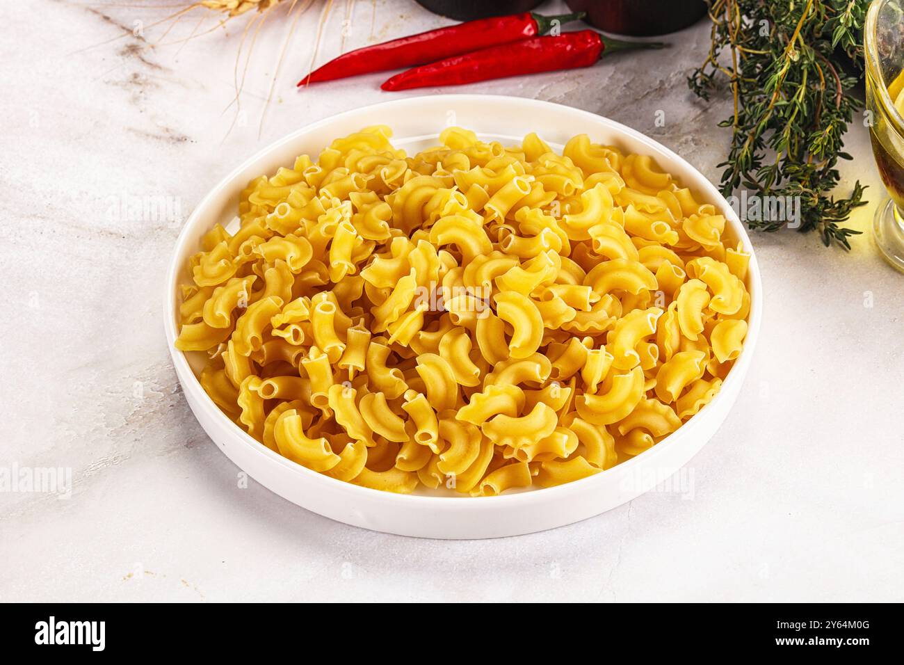 Raw dry Italian pasta Gallo for cooking Stock Photo - Alamy