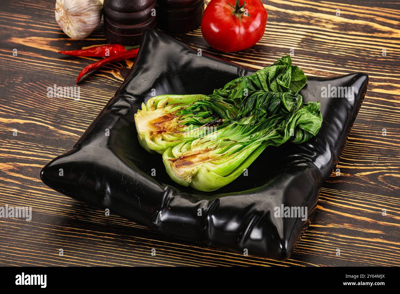 Asian grilled Pak Choy salad snack Stock Photo - Alamy